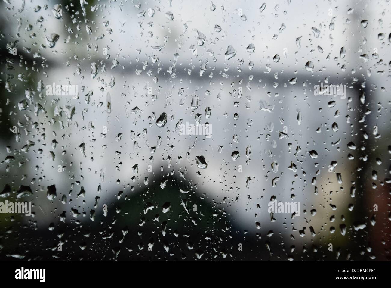 Close up raining outside raindrops hi-res stock photography and images ...