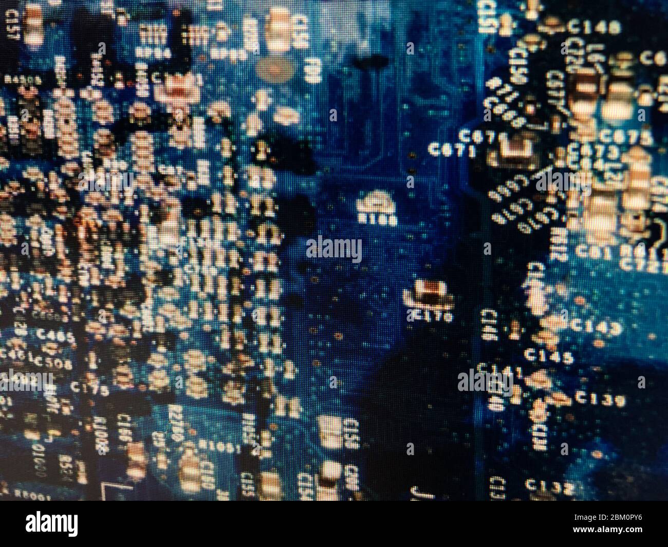 Closeup details of computer circuit board with experimental treatment ...