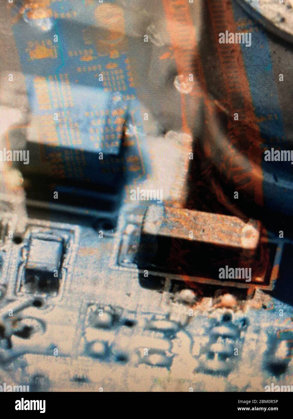 Closeup details of computer circuit board with experimental treatment ...