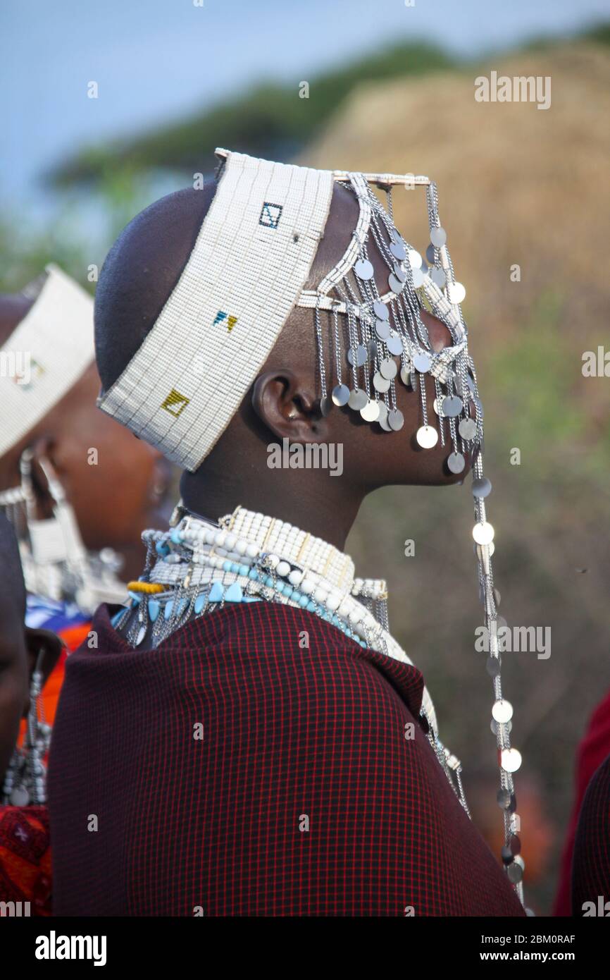 Maasai women in full traditional party outfit, wearing Maasai jewelry ...