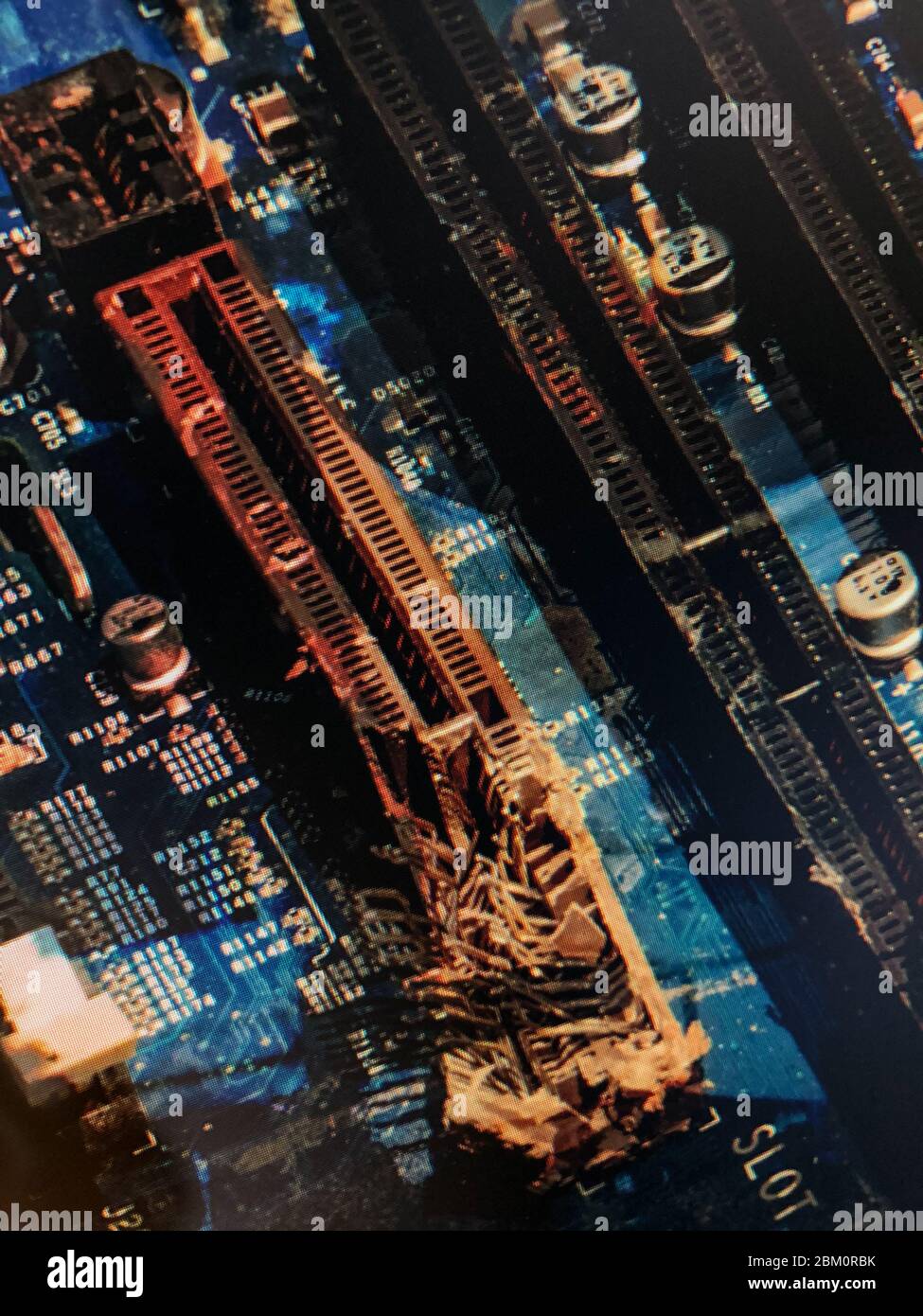 Closeup details of computer circuit board with experimental treatment ...