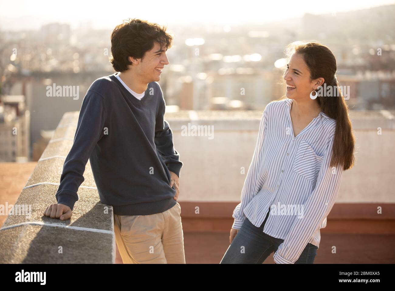Two young brothers talking hi-res stock photography and images - Alamy