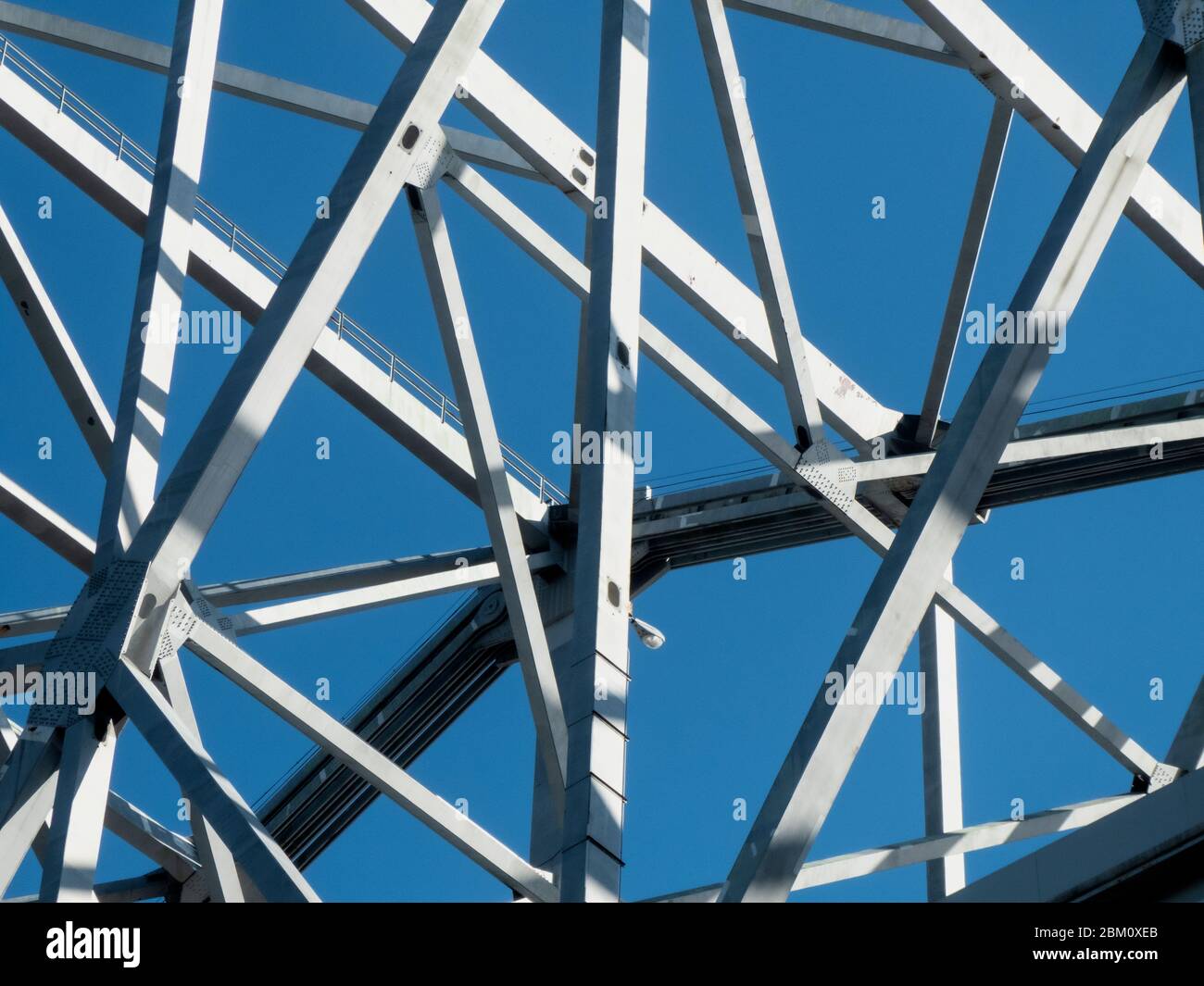metal construction lattice with blue sky background Photographed in New ...
