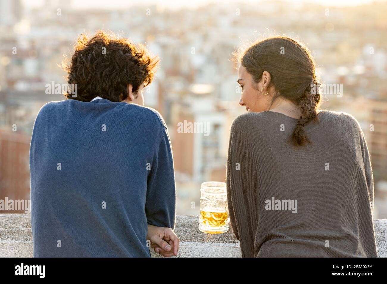 Couple from behind hi-res stock photography and images - Alamy