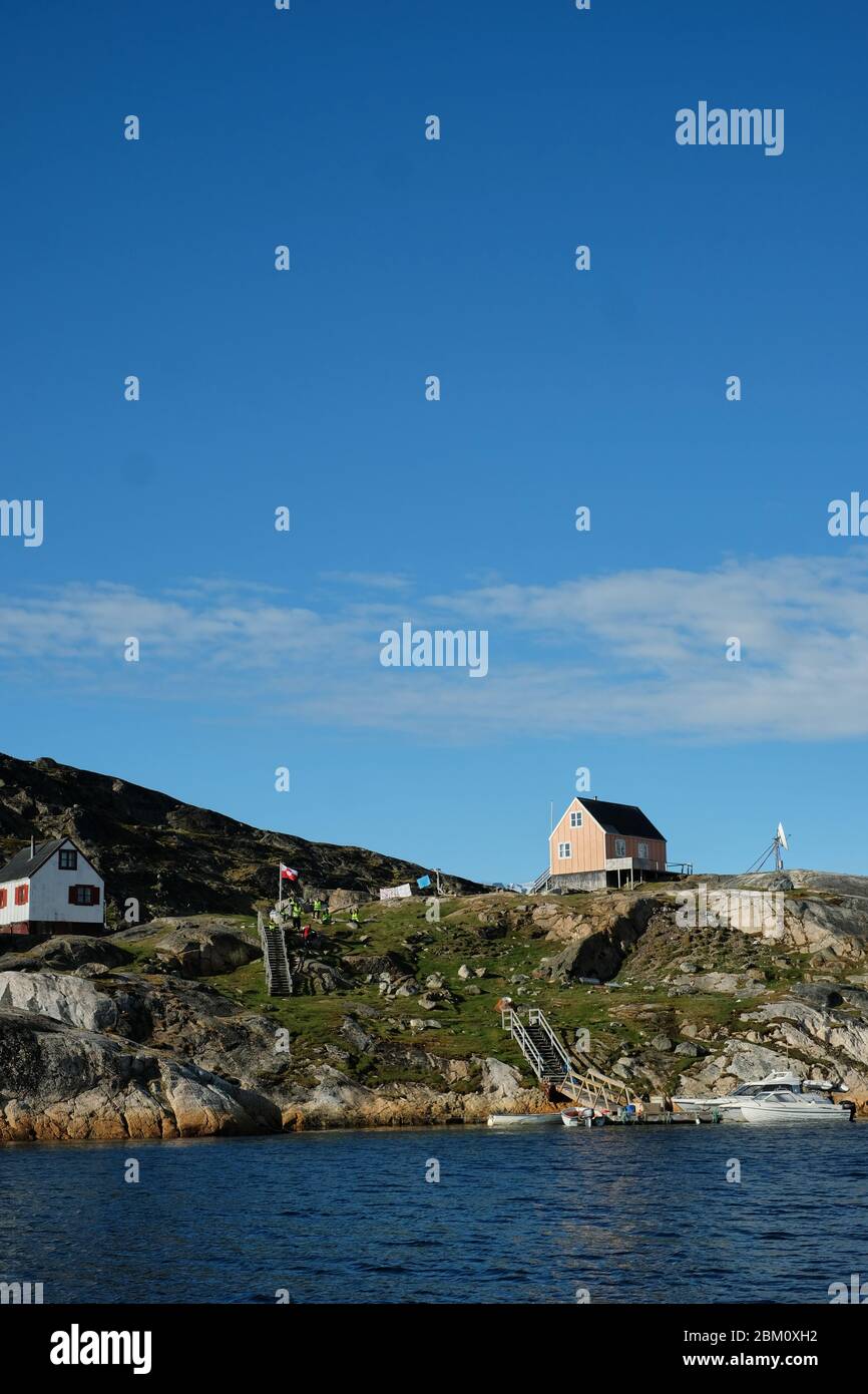 Colorful houses in the settlement of Tasiusaq Greenland Stock Photo - Alamy