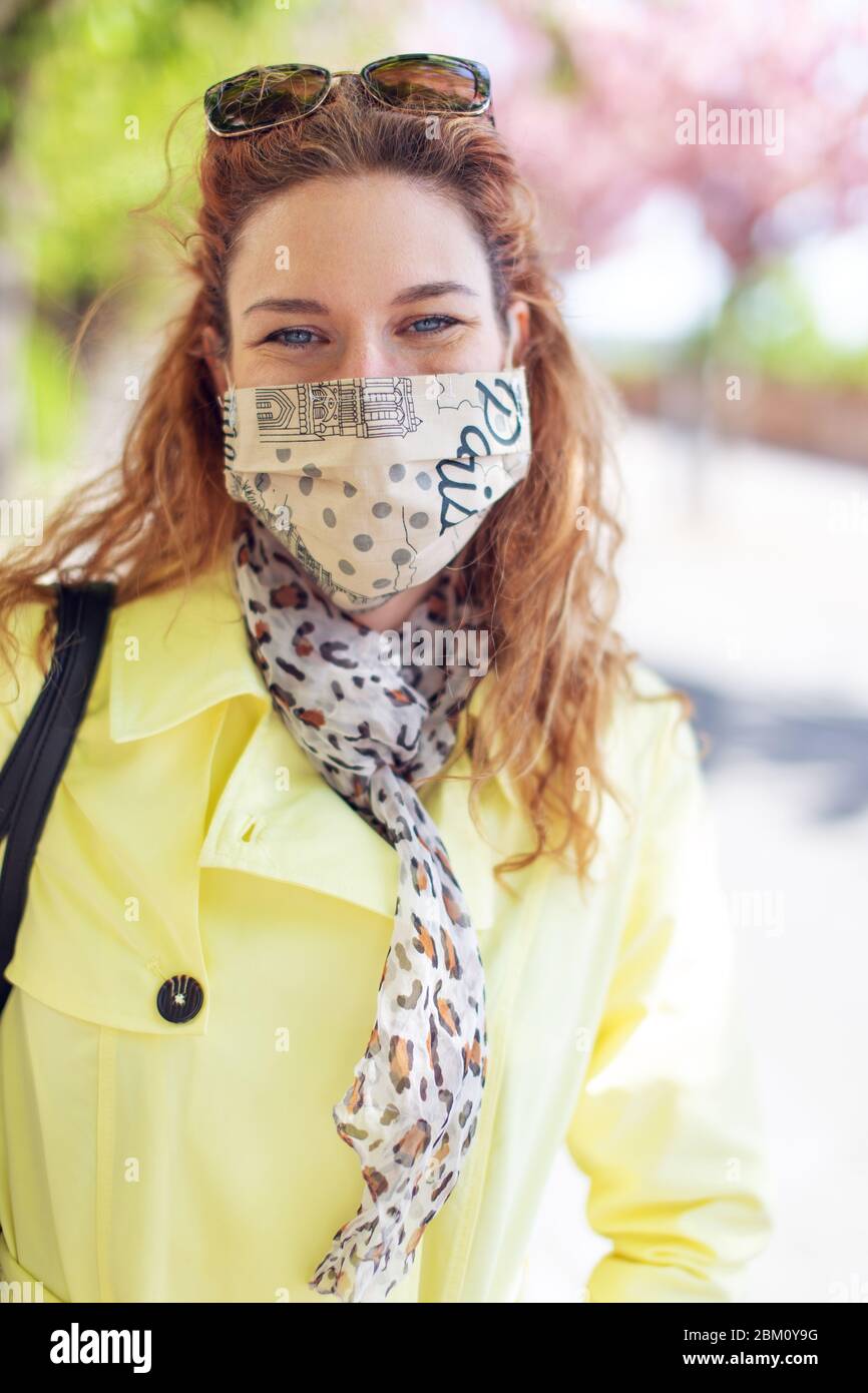 Woman smiling mask hi-res stock photography and images - Alamy