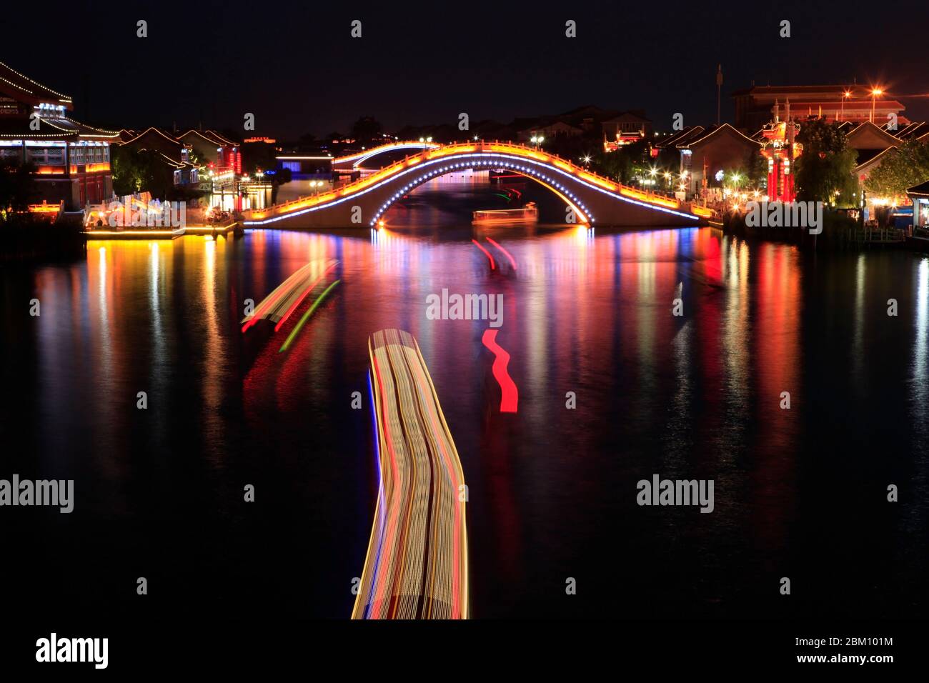 On the river, the lights are reflected in the water, very beautiful ...