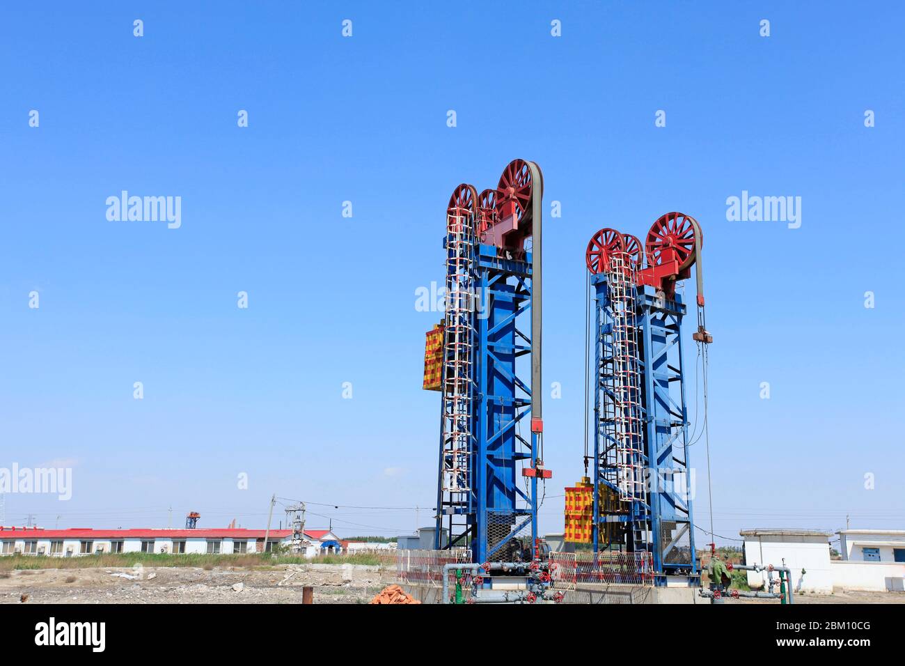Oil field scene, beam pumping unit and tower type pumping unit in the ...