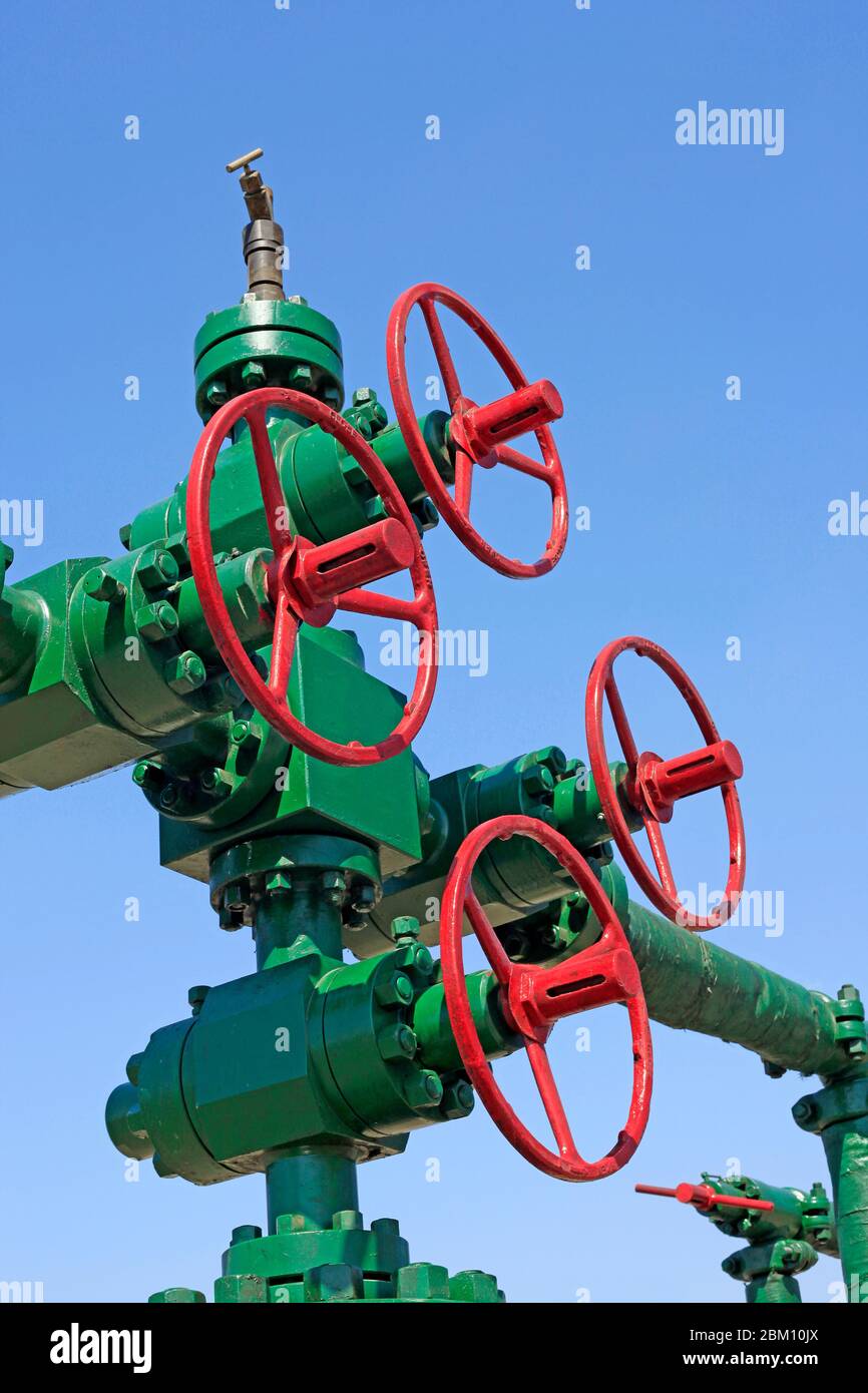Oil field scene, pipeline valves Stock Photo - Alamy