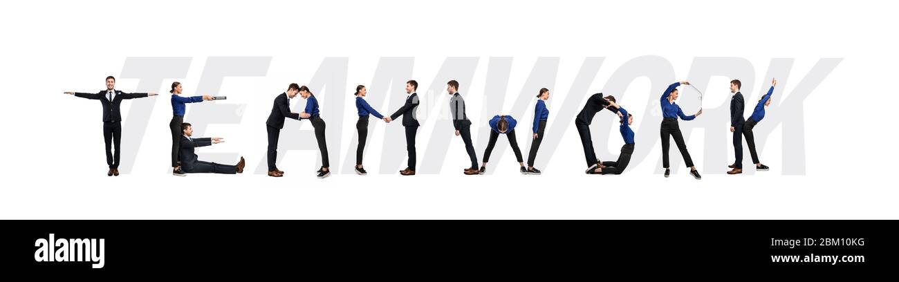 Group of people forming teamwork word at studio Stock Photo - Alamy