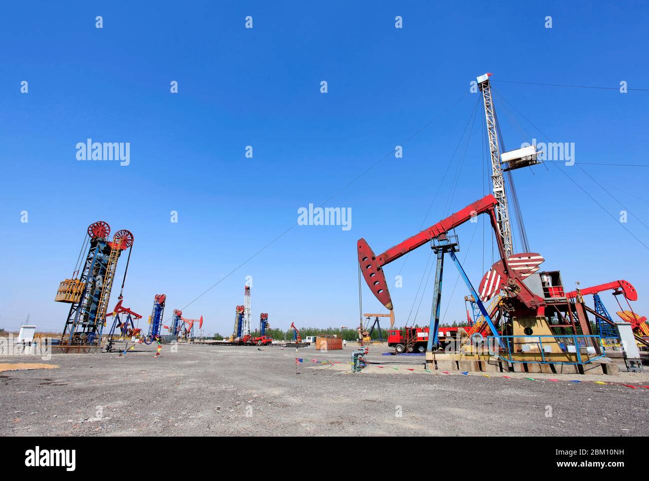 Oil field scene, beam pumping unit and tower type pumping unit in the ...