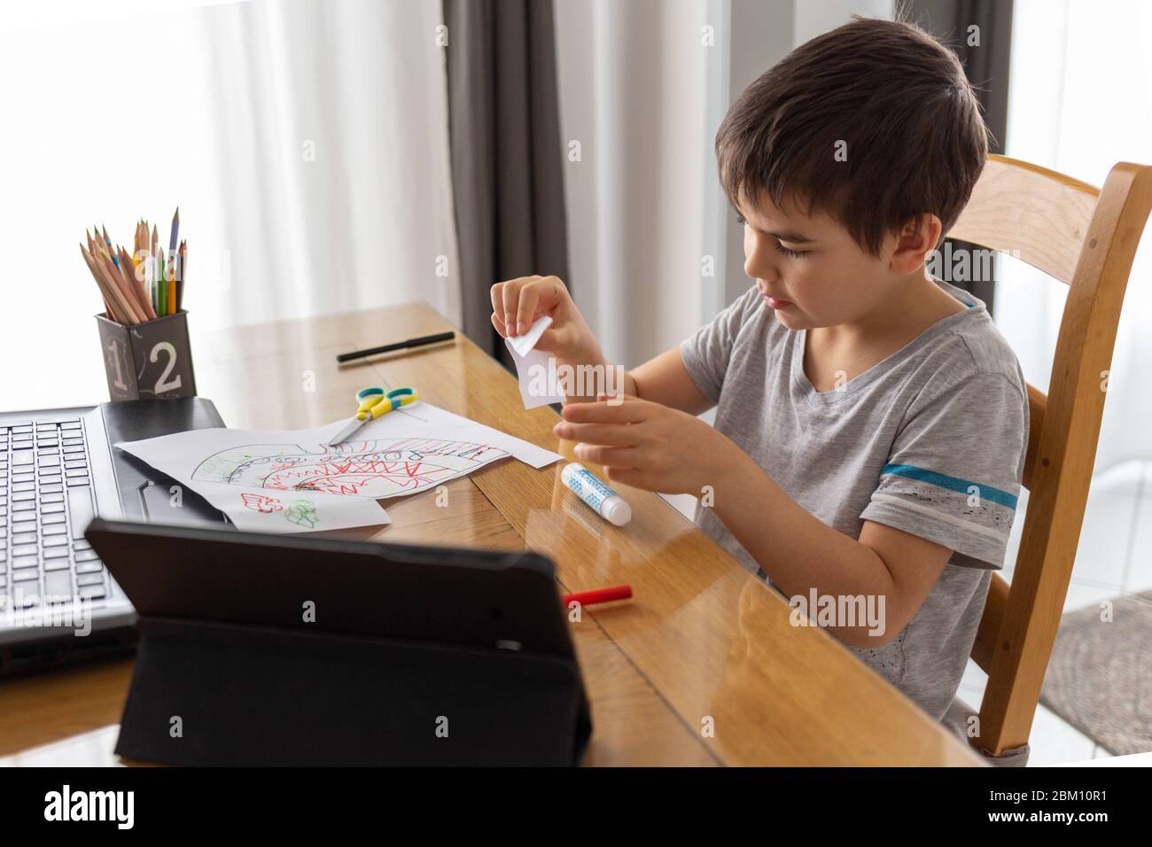 distance learning online, boy studying from home, kids using technology ...