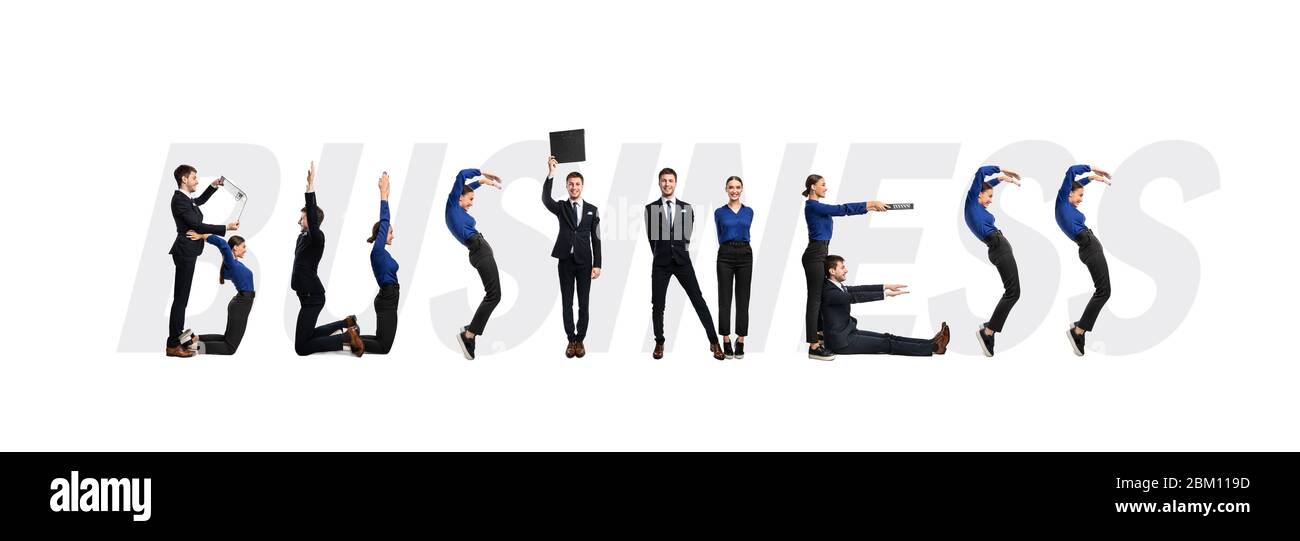 Group of people forming business word at studio Stock Photo - Alamy