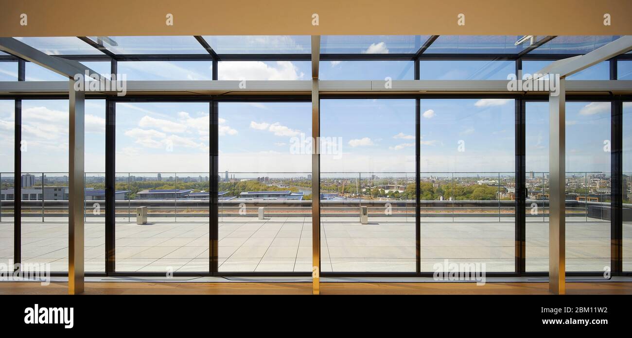 View of London through full-height windows. Circus West Village ...