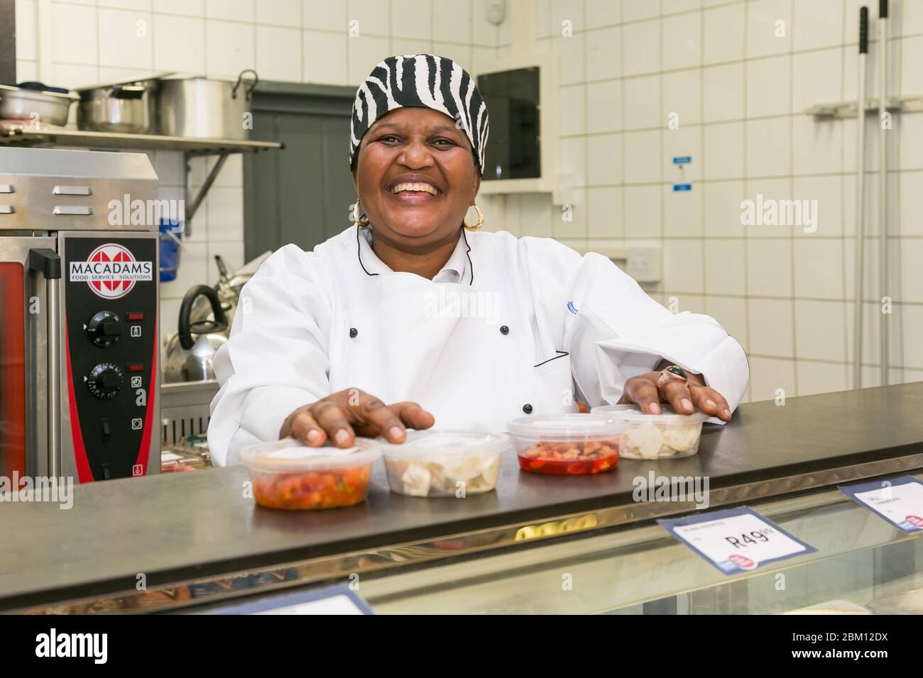 African staff shelves store hi-res stock photography and images - Alamy