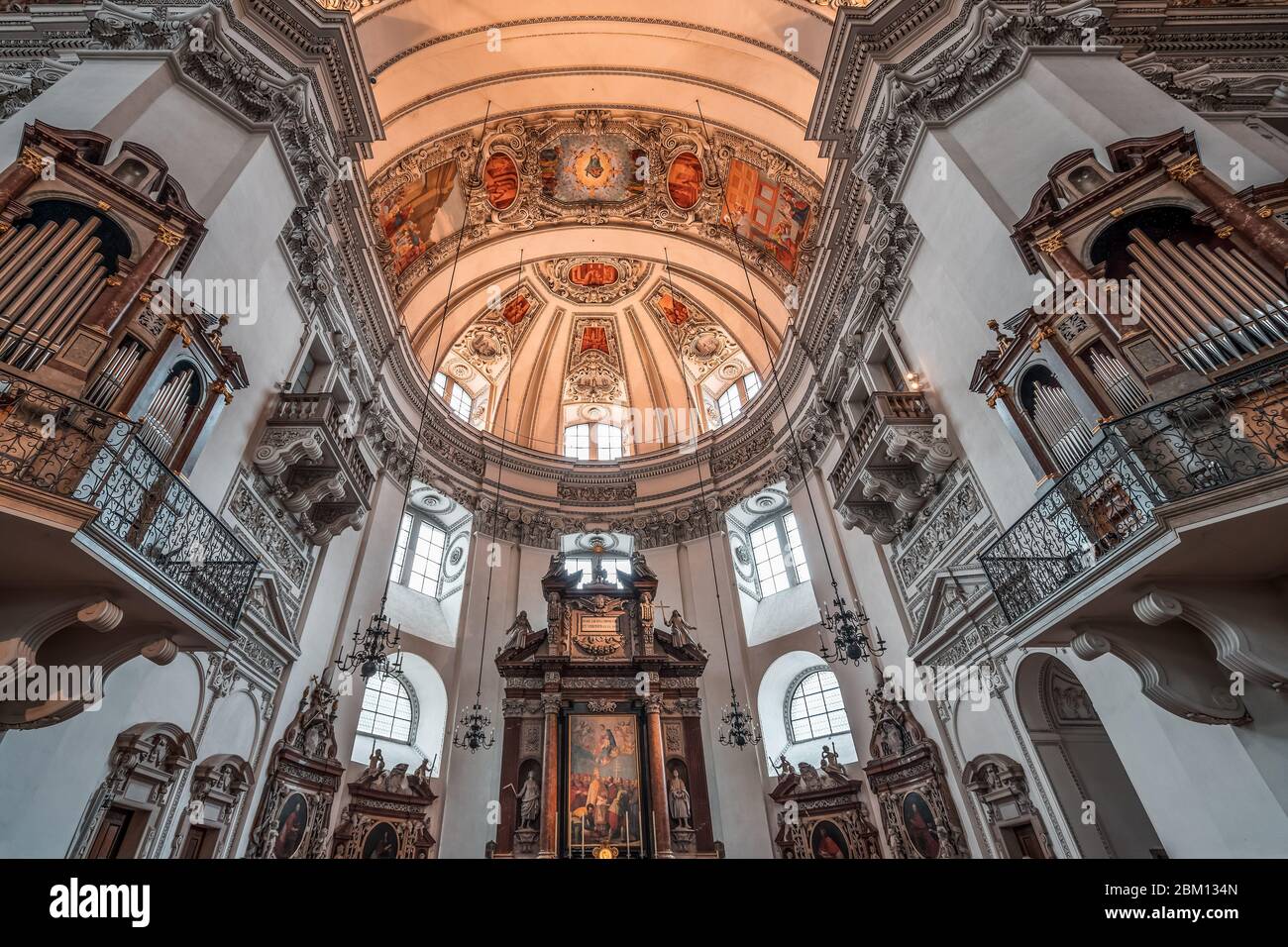 Ultrawide view of central dome ceiling with organ pipe pulpit inside ...