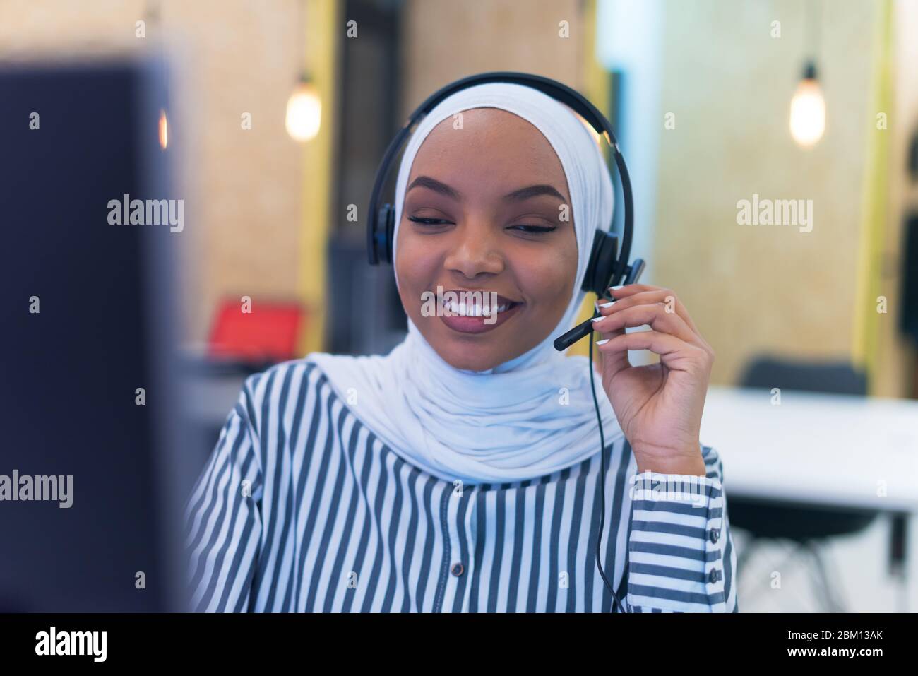African muslim female with hijab scarf customer representative business ...