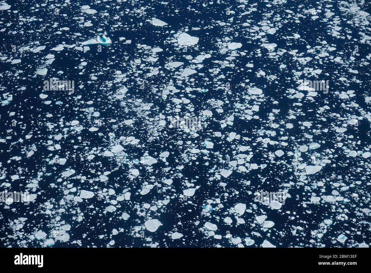 Melting sea ice in Greenland arctic region from above Stock Photo - Alamy