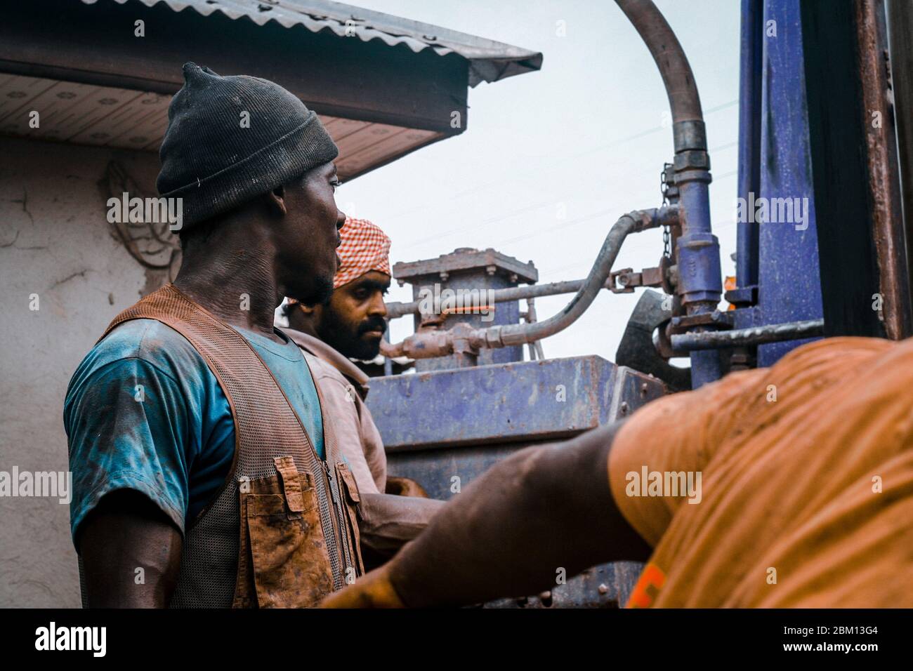 Kumasi,Ghana - April 20 , 2020 : People making borehole with drilling ...