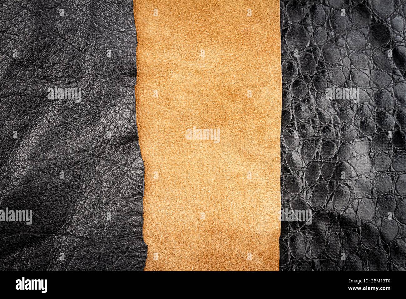Brown and black leather and artificial alligator skin textures ...
