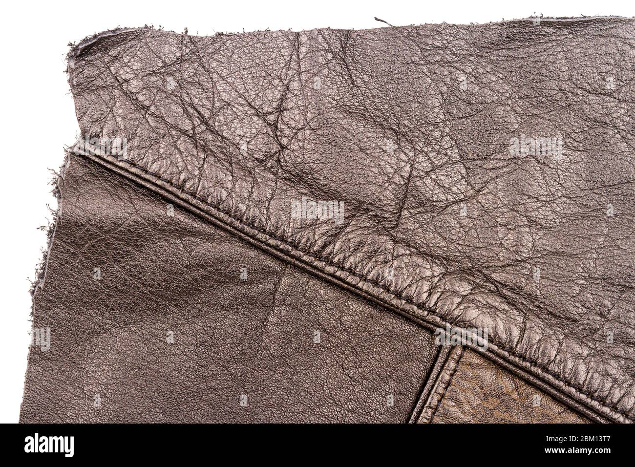 Piece of brown leather isolated on white background. Crumpled material ...
