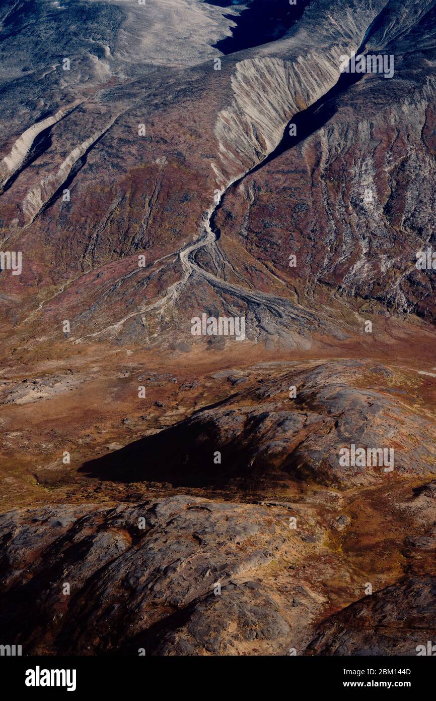 Fall colored raw mountain side in Greenland Stock Photo - Alamy