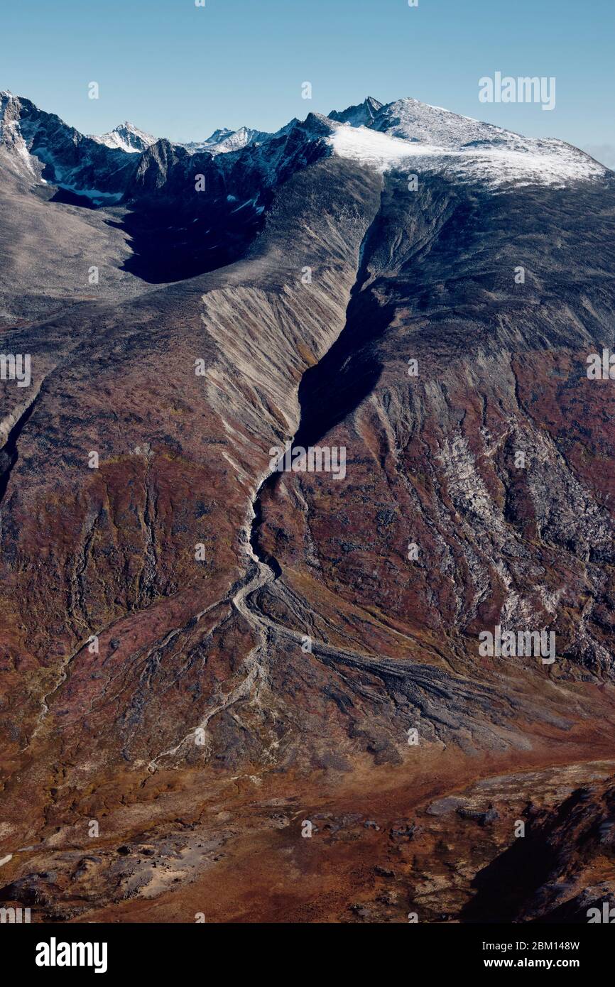 Fall colored raw mountain side in Greenland Stock Photo - Alamy