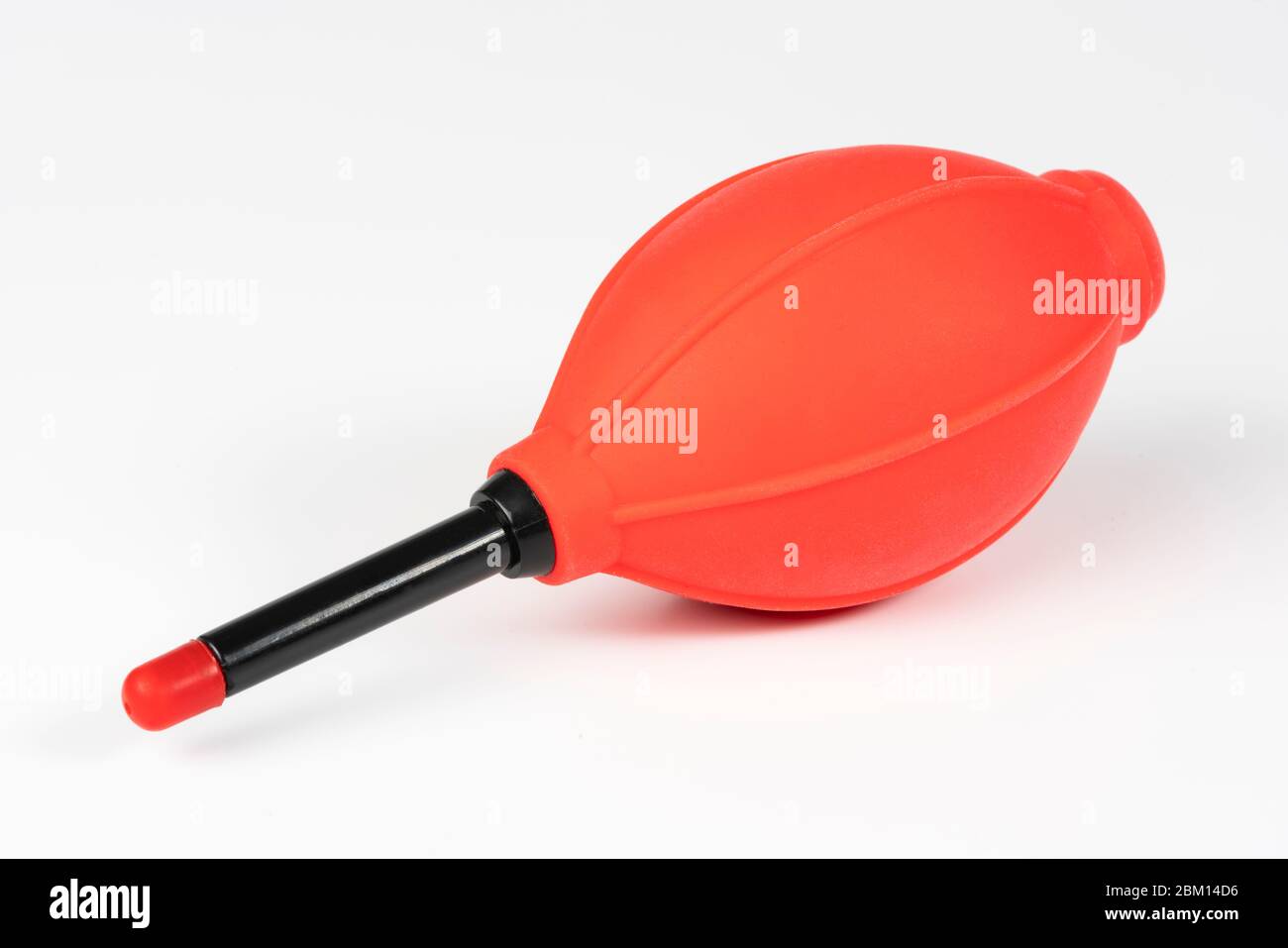 Red and black camera air blower for clearing dust particles from lens ...