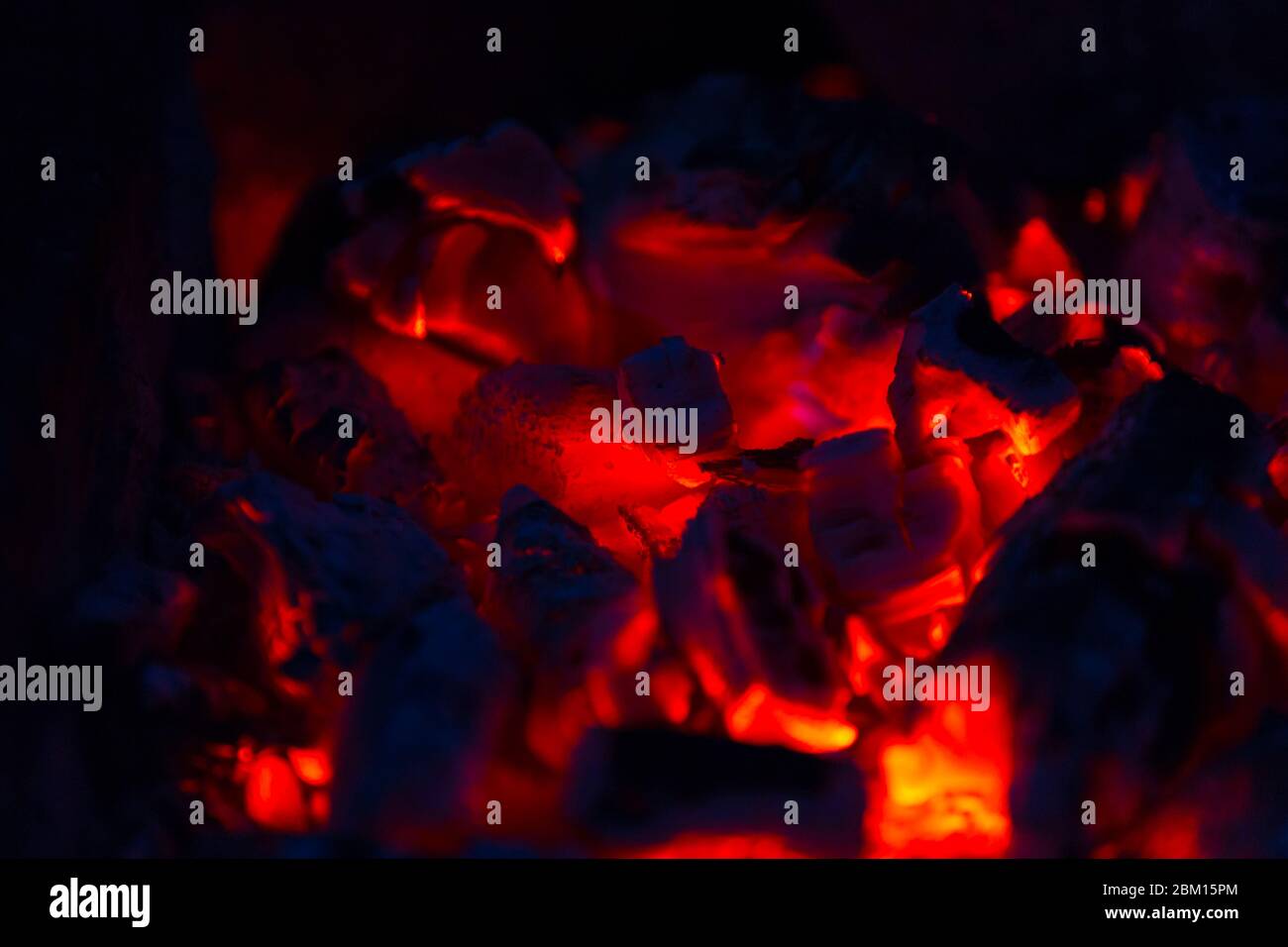 Red coals of the campfire in the dark night closeup Stock Photo - Alamy