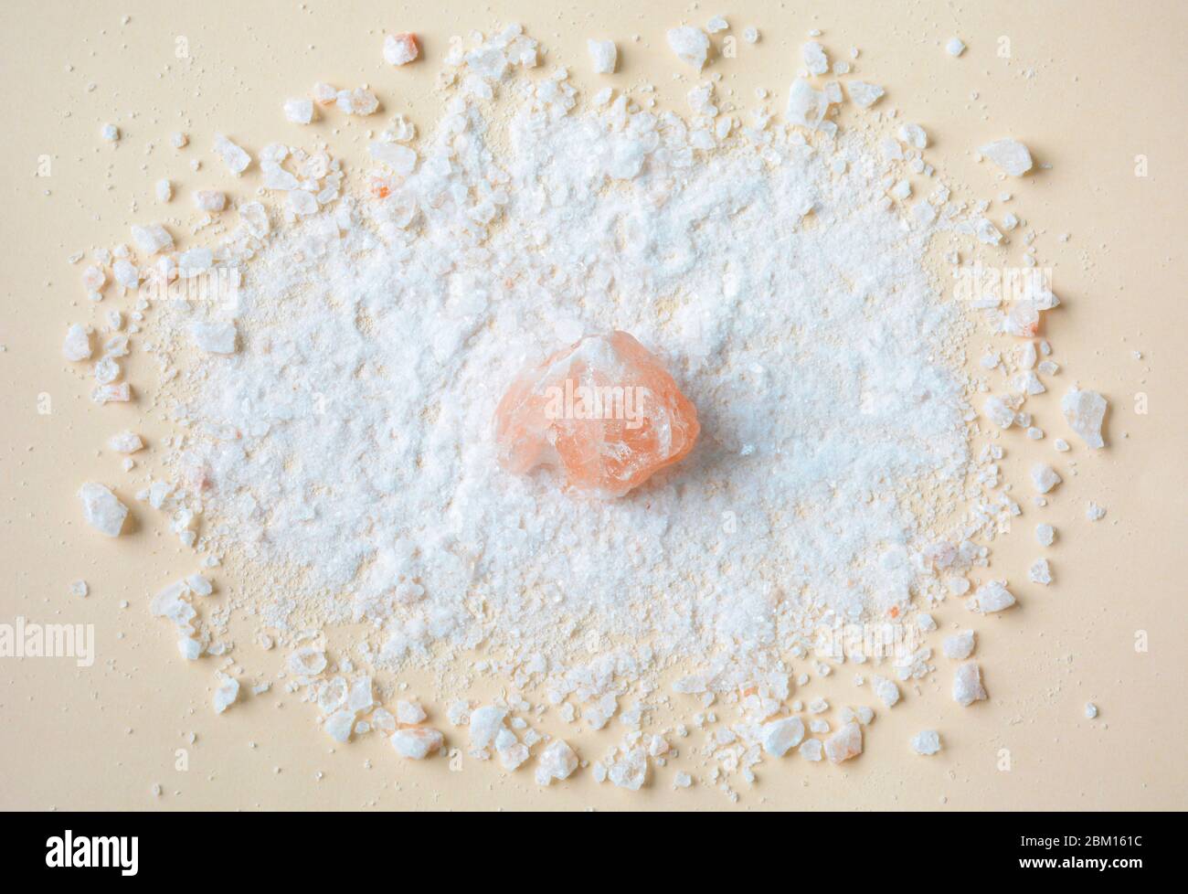 Top view Himalayan crushed coral pink rock salt pieces Stock Photo - Alamy