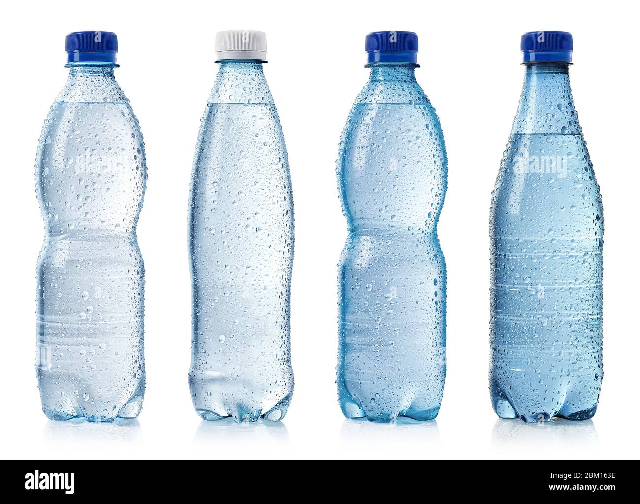 Collection of various cold bottles of water with drops isolated on ...
