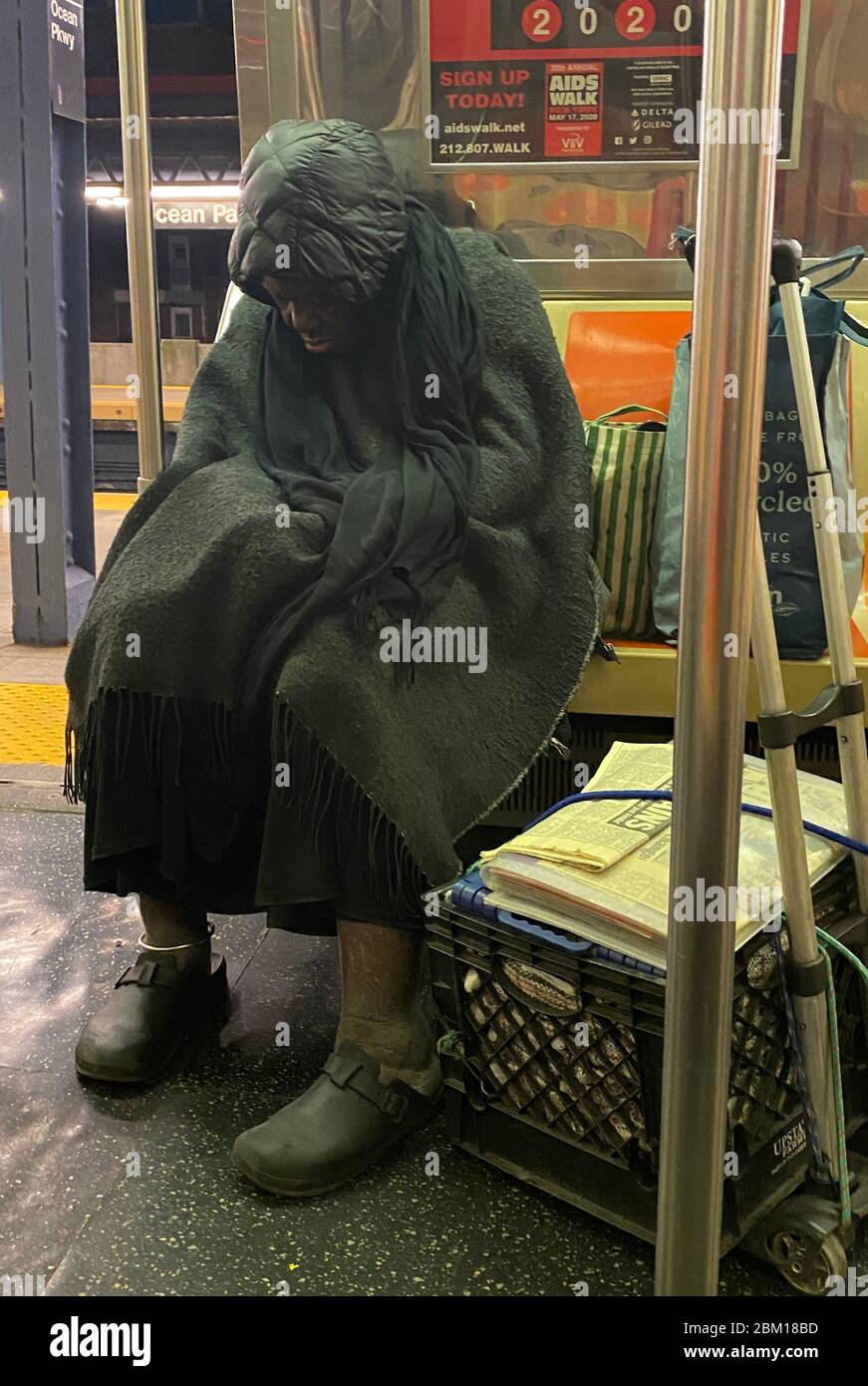 New York, NY, USA. 5th May, 2020. Homeless woman sleeping on the subway ...