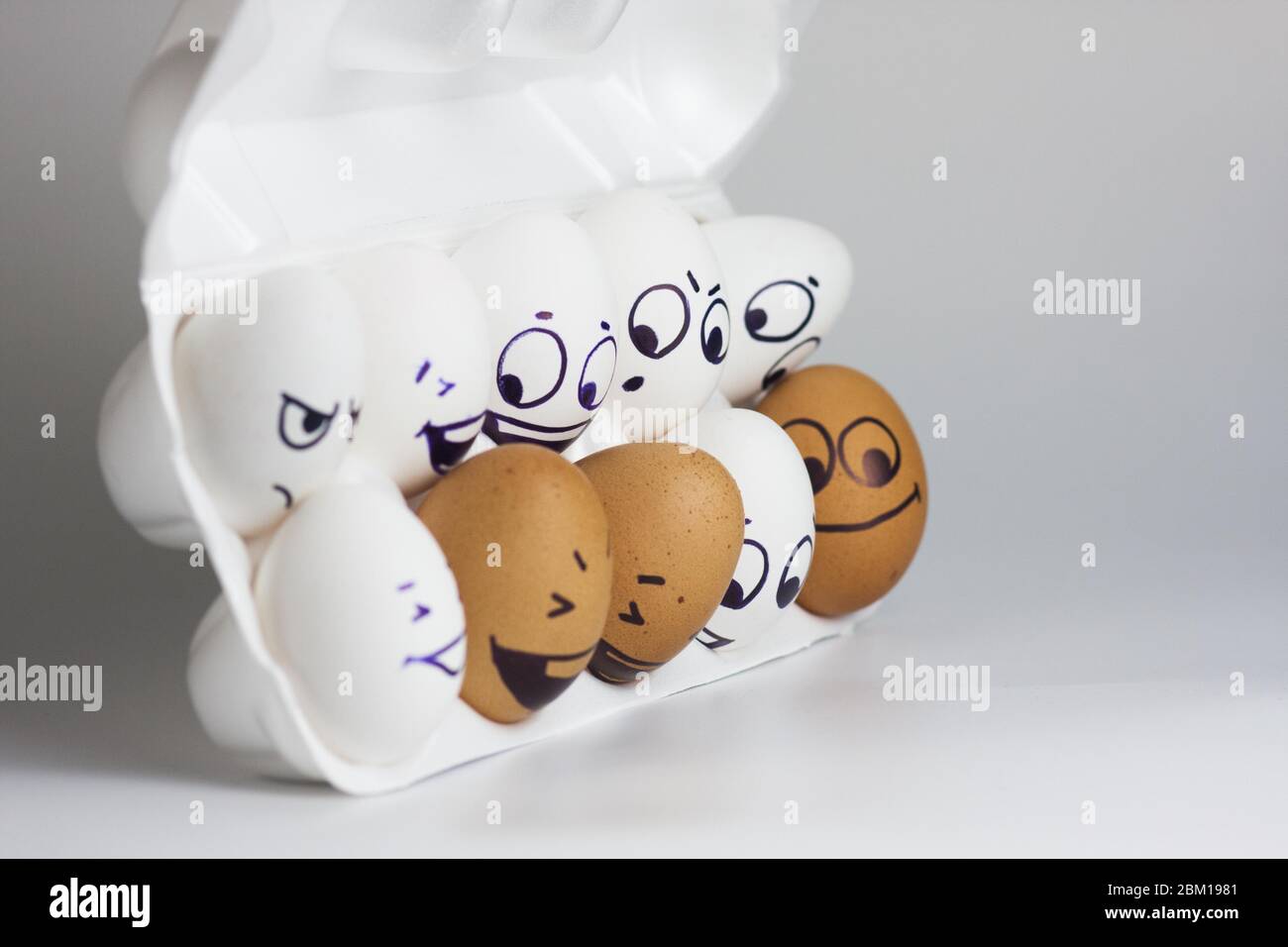 Eggs with funny and funny faces. funny eggs on a white background Stock Photo - Alamy