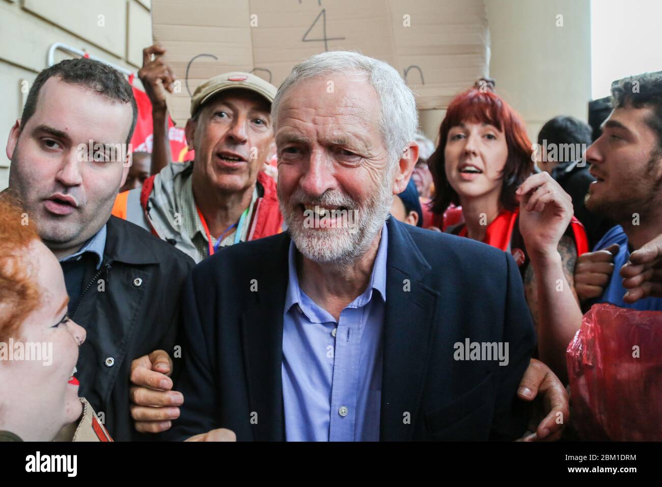 Jeremy Corbyn is surrounded by supporters after speaking at a campaign ...