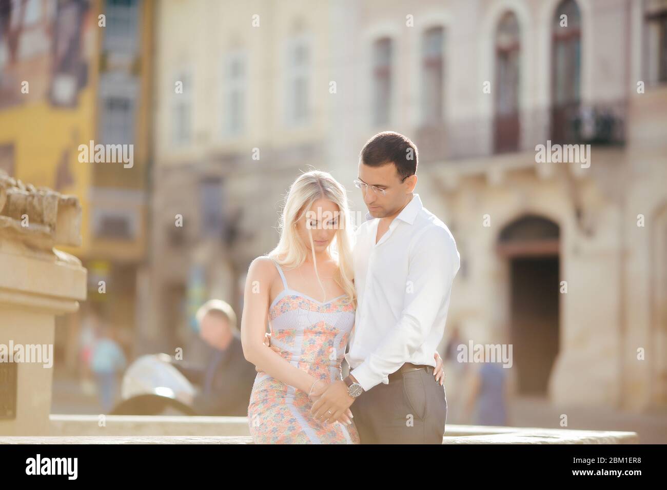 Romantic tourist couple walking around the city relaxing Stock Photo ...