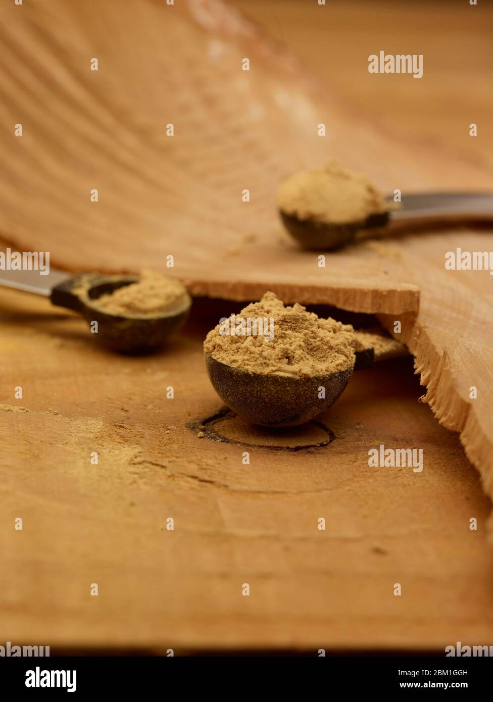 Close-up still life of ground ginger in measuring spoon, food ...