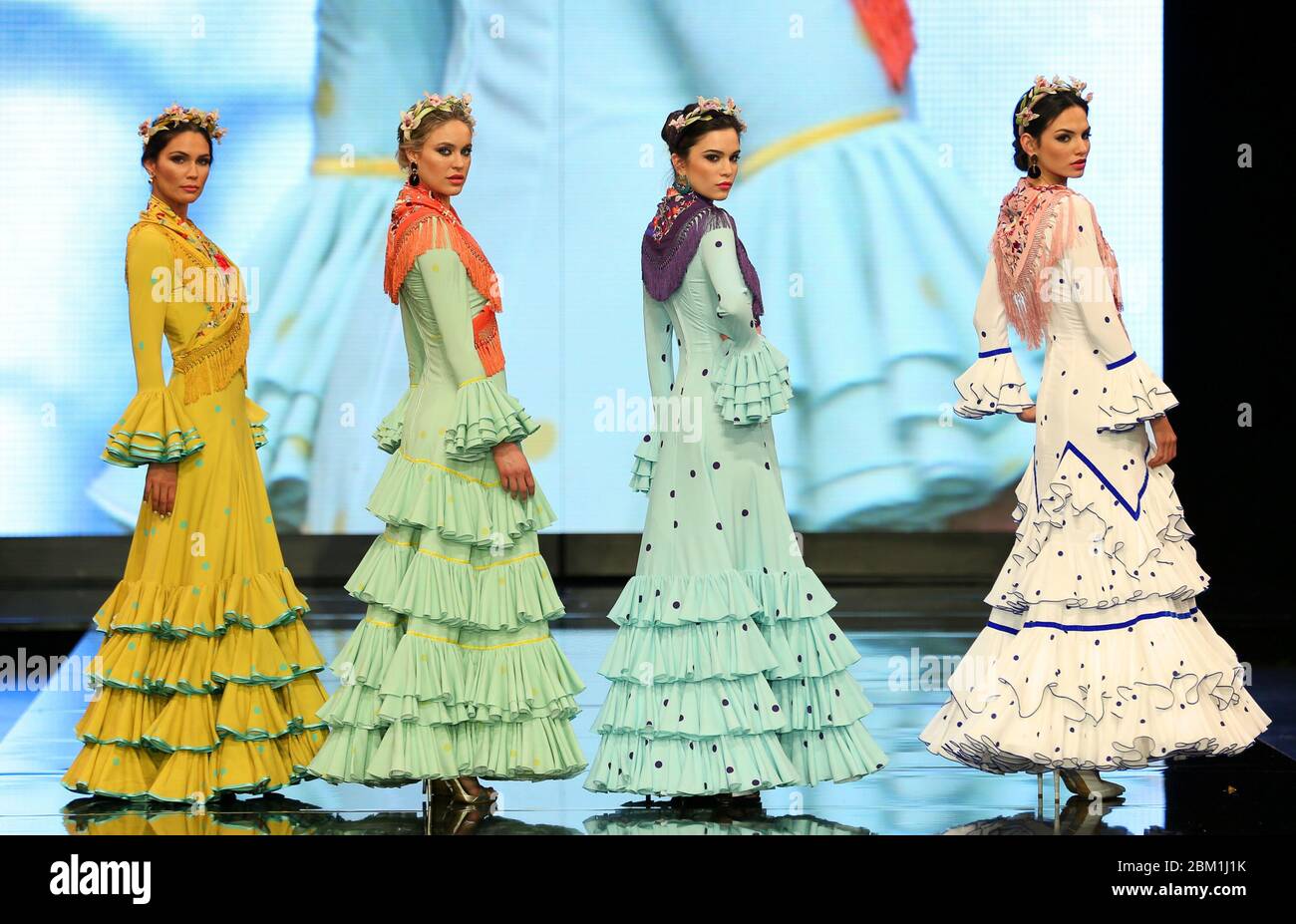 SEVILLA, SPAIN - JAN 30: models wearing dresses from the Bajo el Soul ...