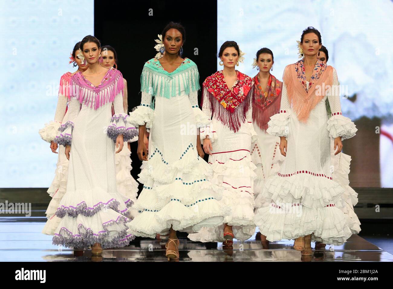 SEVILLA, SPAIN - JAN 30: models wearing dresses from the Bajo el Soul ...