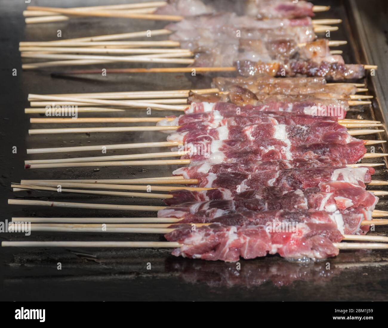 Shish kebab, a popular meal of skewered and grilled cubes of meat. It ...