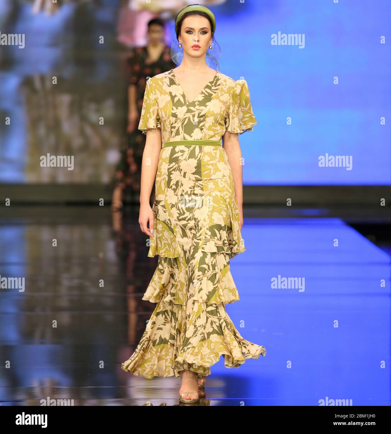 SEVILLA, SPAIN - JAN 30: Model wearing a dress from the Bajo el Soul de ...