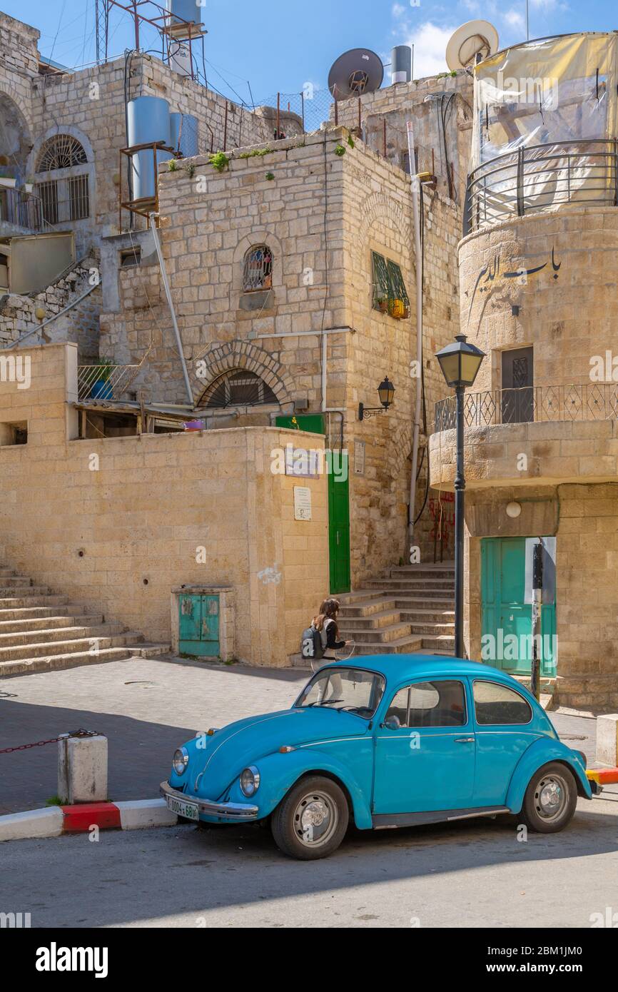 View of blue Volkswagen Beetle on street in Bethlehem, Palestine ...