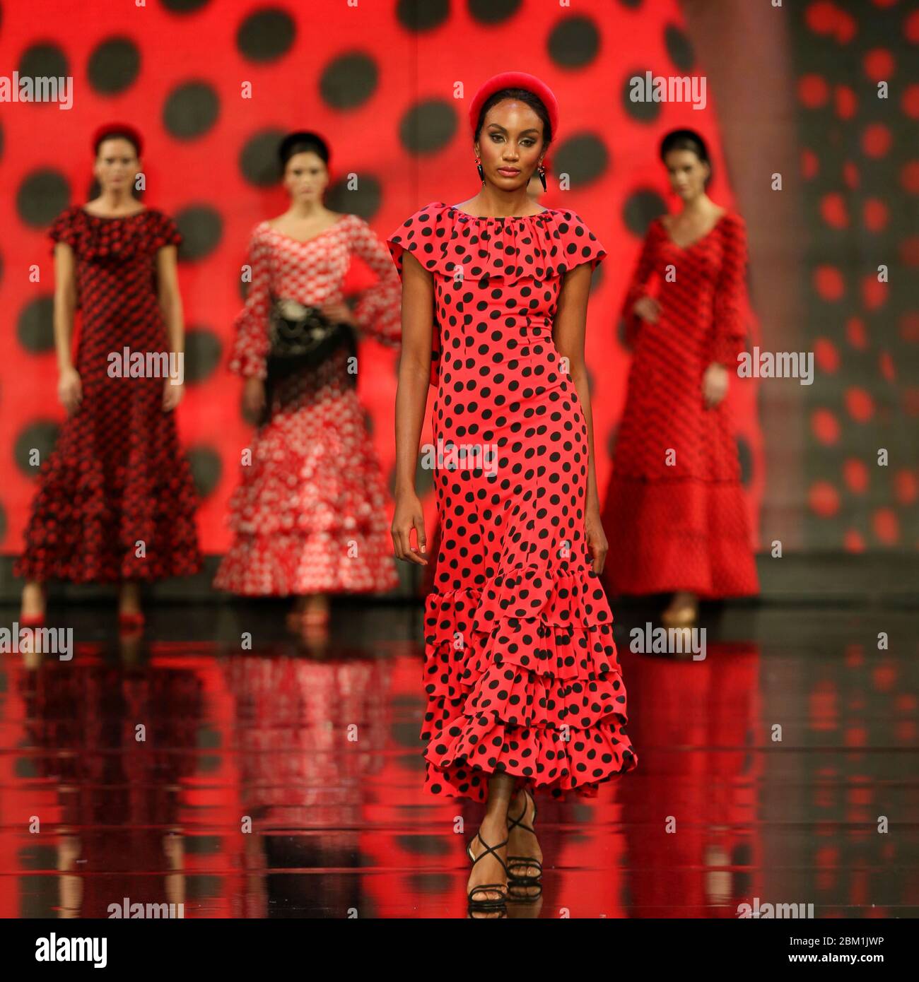 SEVILLA, SPAIN - JAN 30: Model wearing a dress from the Bajo el Soul de ...