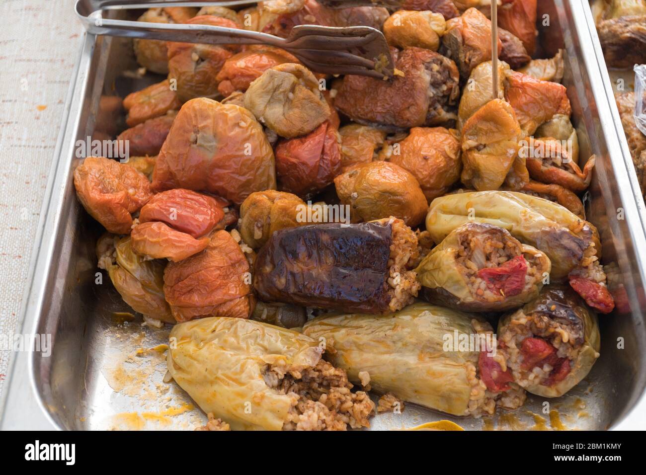 Traditional fresh vegetables atuffed with a mixture of rice and onion ...