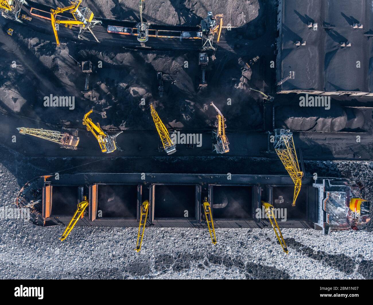 Industrial photo, Loading coal mining in port ship with crane. Aerial ...