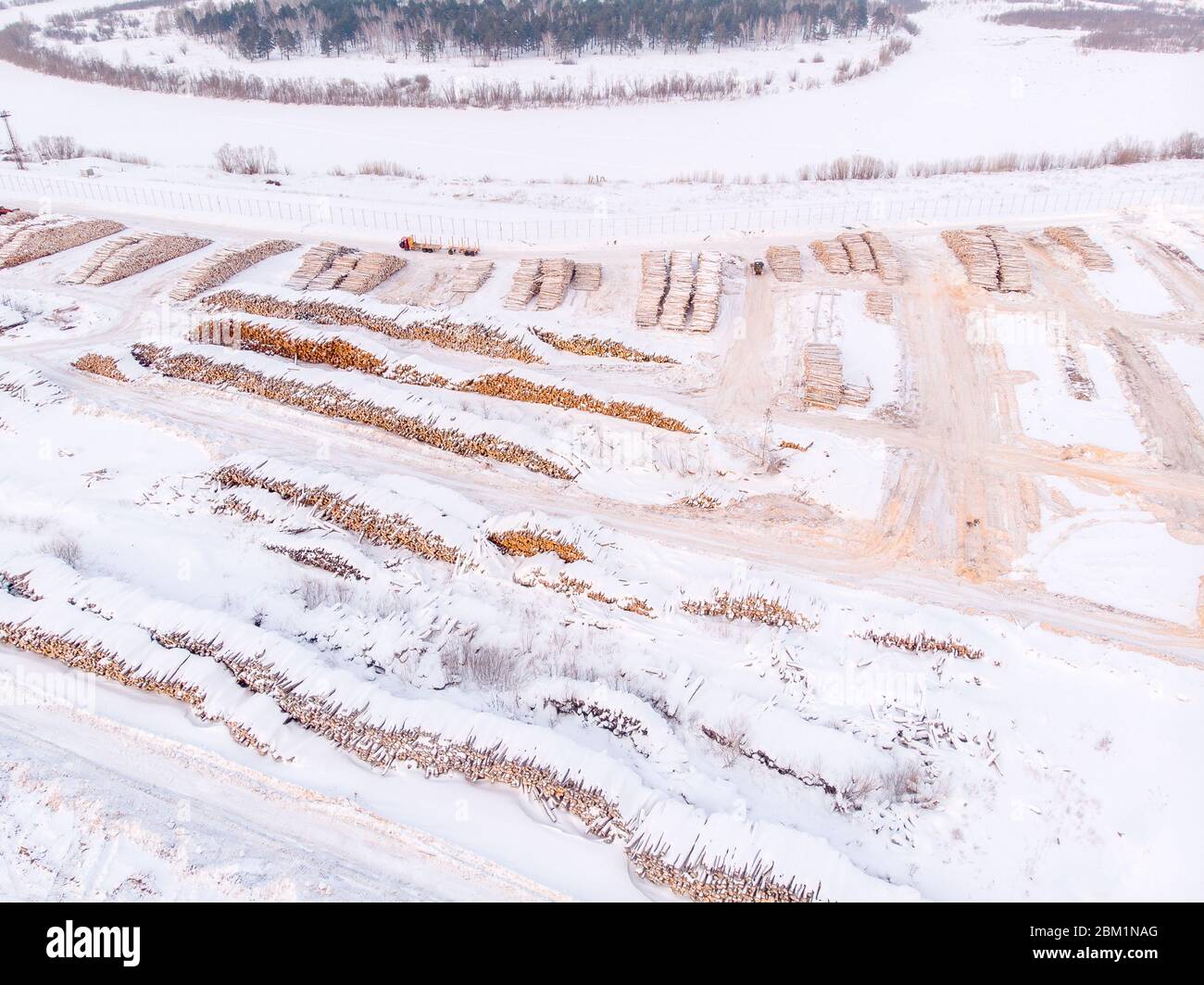 Lumber mill log storage with logging equipment hi-res stock photography ...