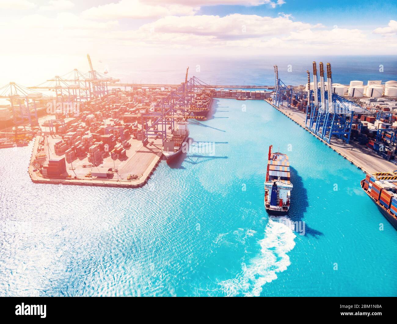 Cargo port business, logistics center. Ship is loading containers with ...