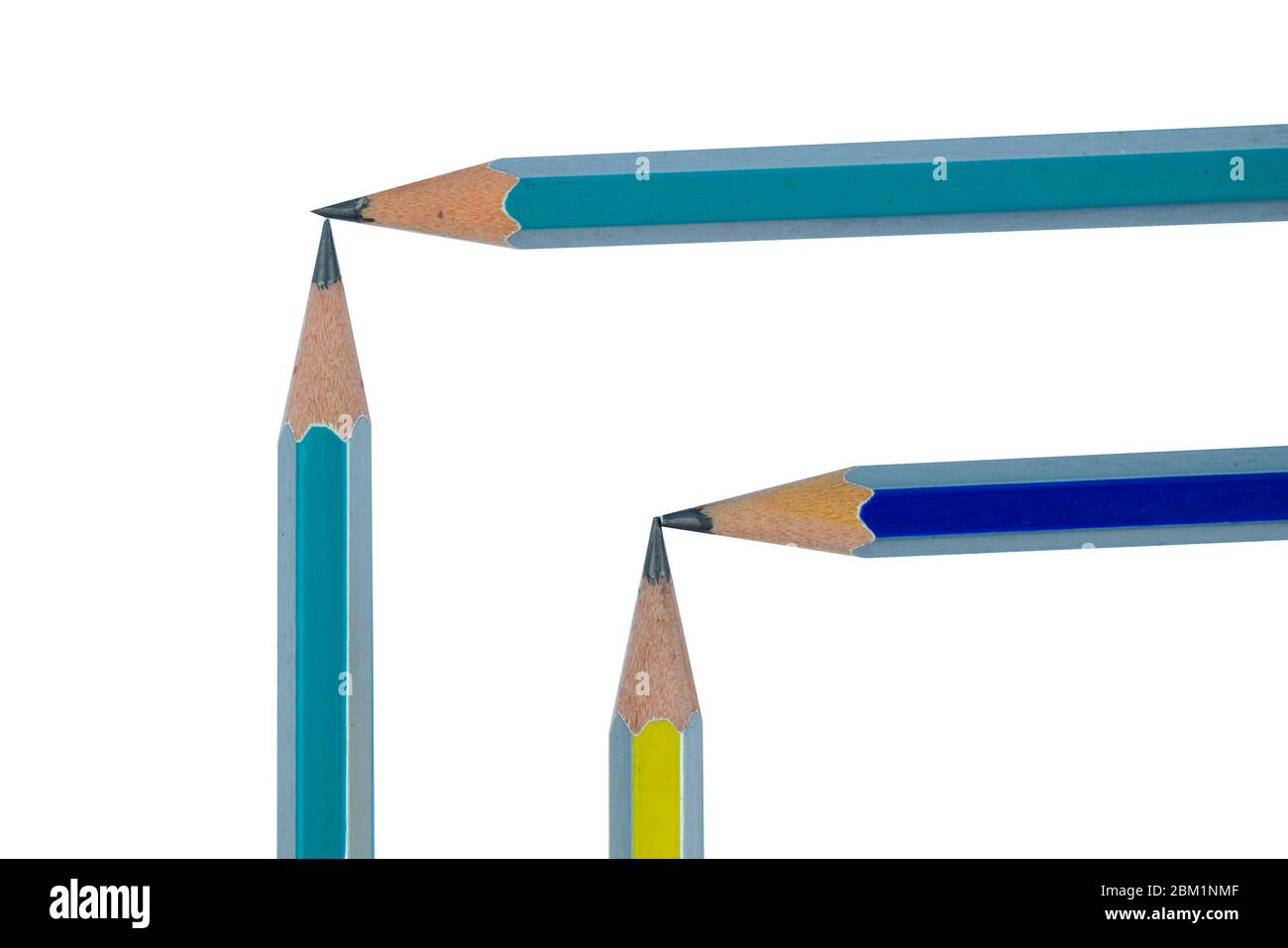 Four various colored wood pencil crayon making two corner on two ...