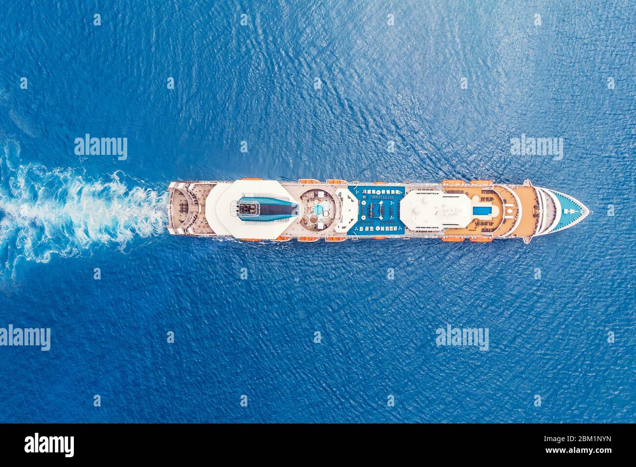 Cruise liner ship in ocean with blue water. Aerial top view Stock Photo ...