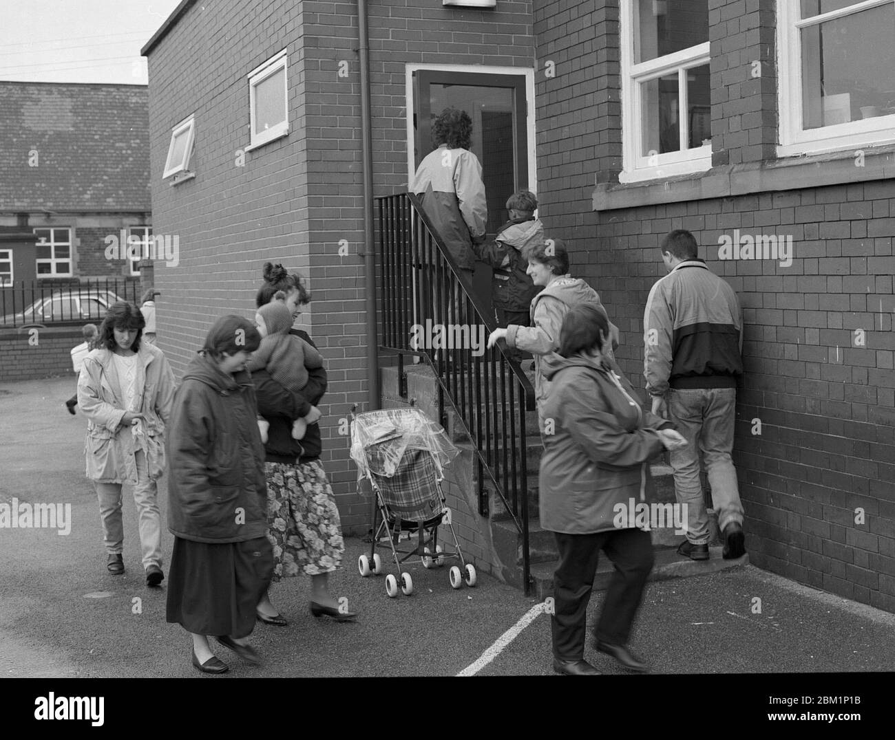 1994 children and parents going to a primary school, start of day ...