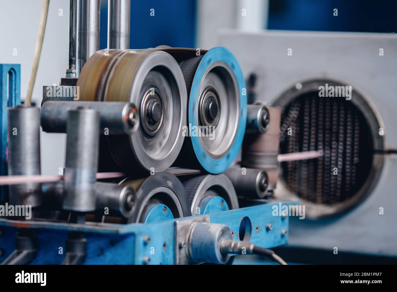 Production of copper wire, bronze cable in reels at factory Stock Photo ...